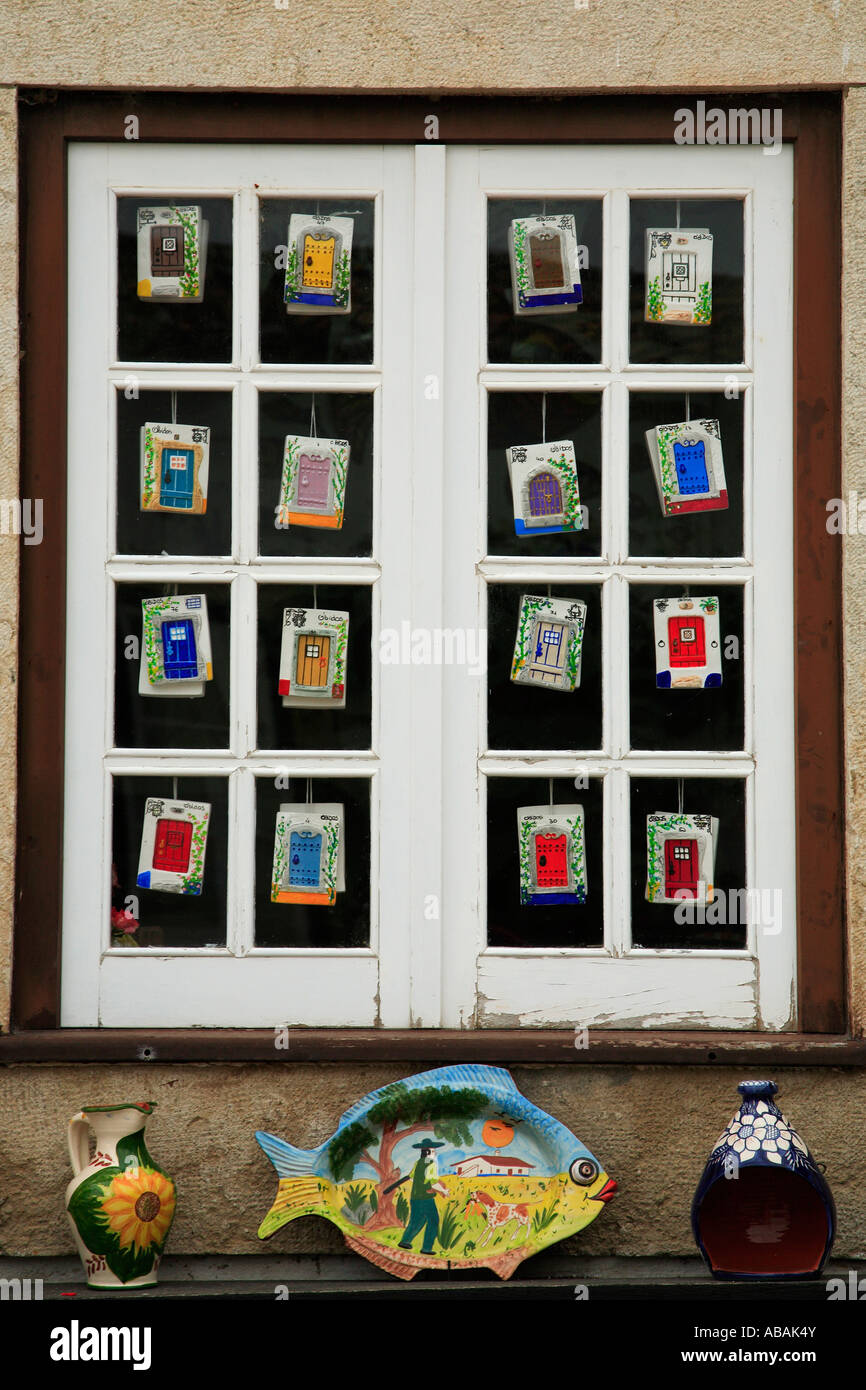 Portugal Obidos window with handicraft display Stock Photo - Alamy