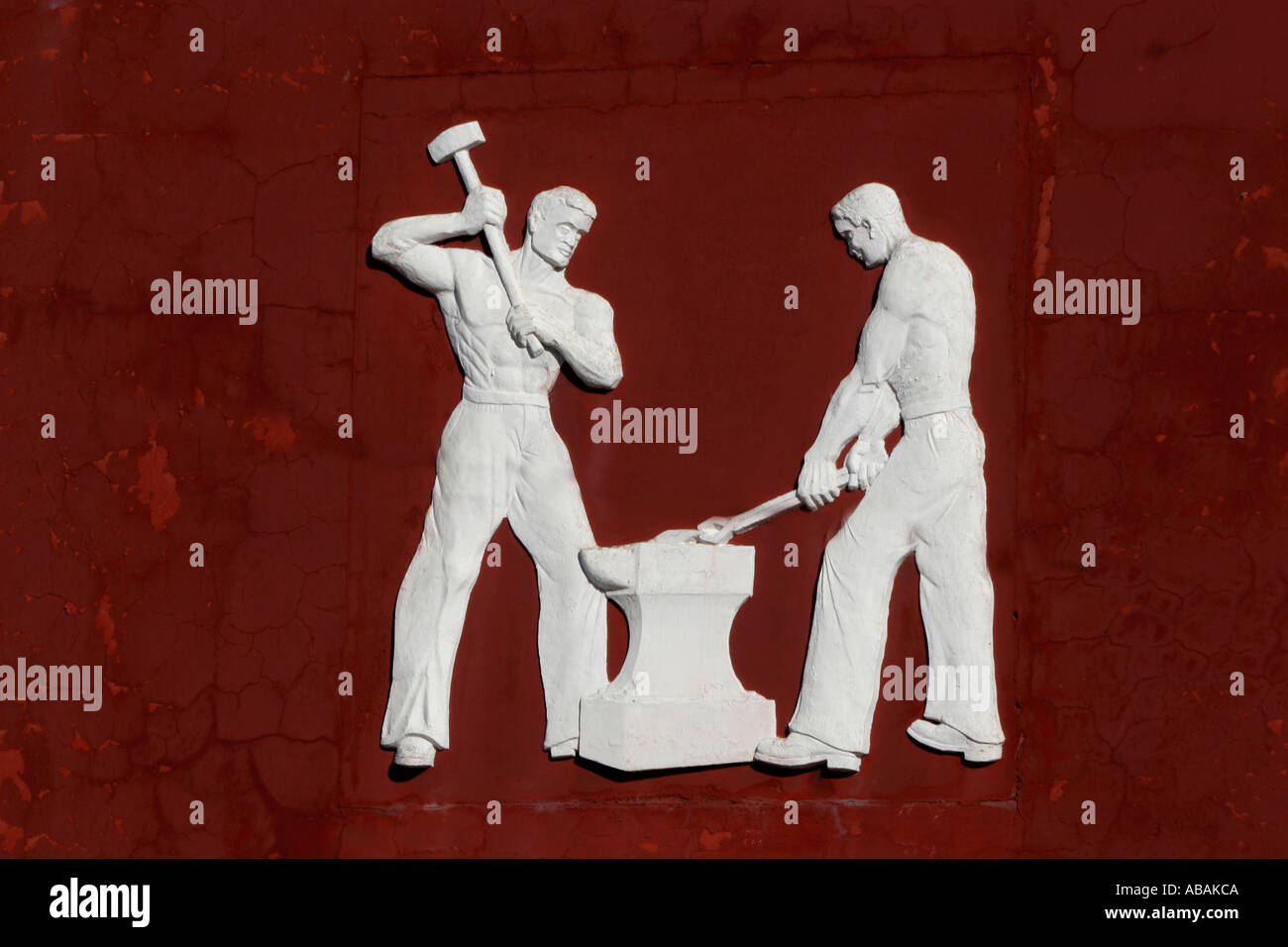 Men using anvil Stock Photo - Alamy