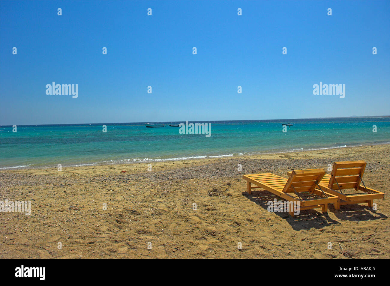Wooden reclining deck chairs on Tondoba beach Red Sea Egypt Stock Photo ...