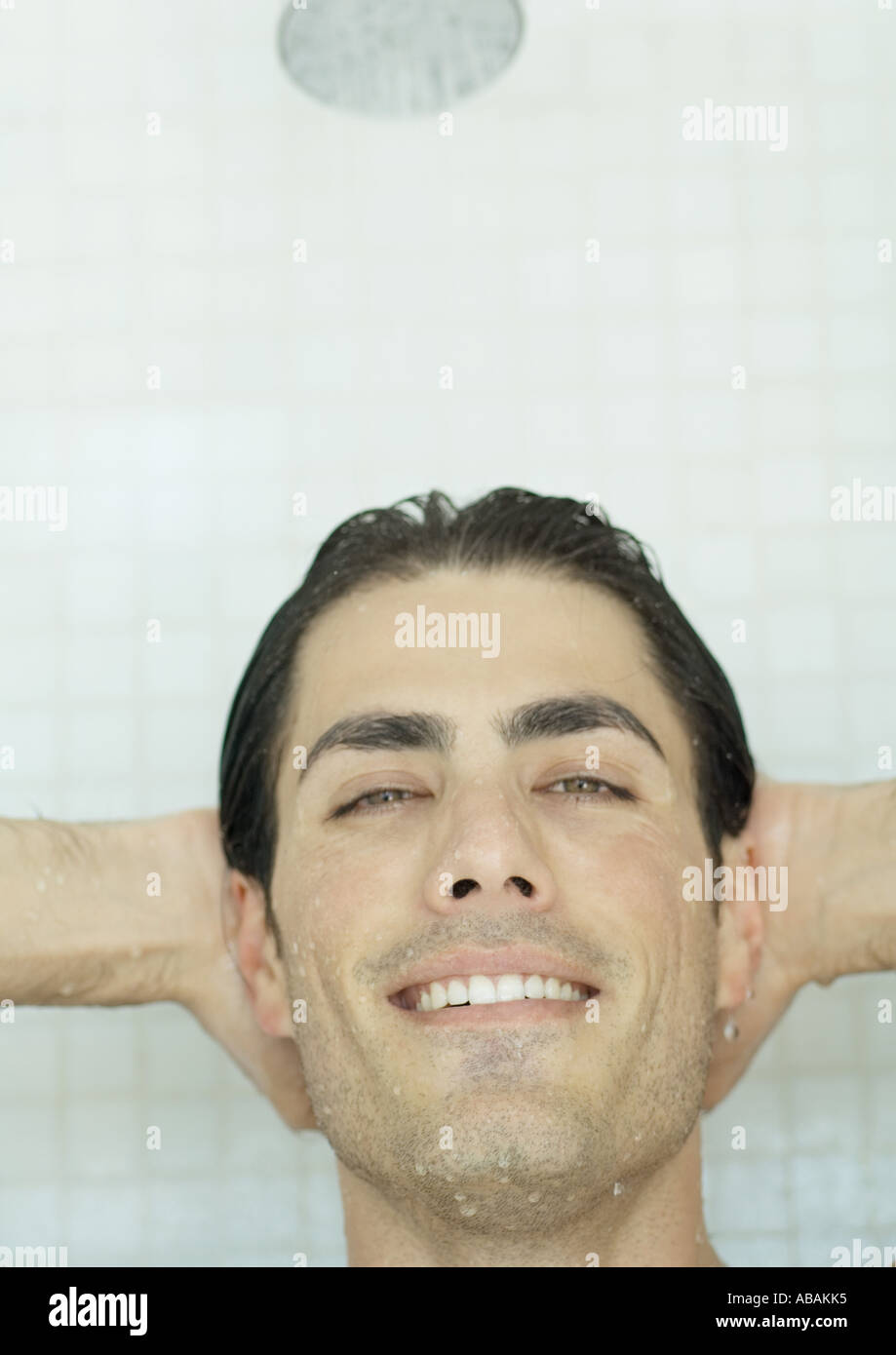 Man taking shower behind wet hi-res stock photography and images - Alamy