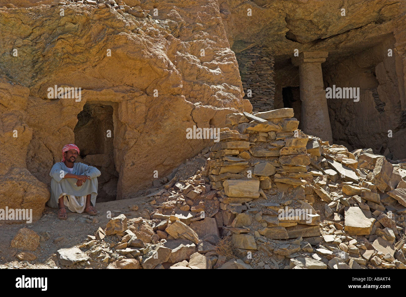 Ababda tribesman sitting by temple entrance at Cleopatra emerald mines ...