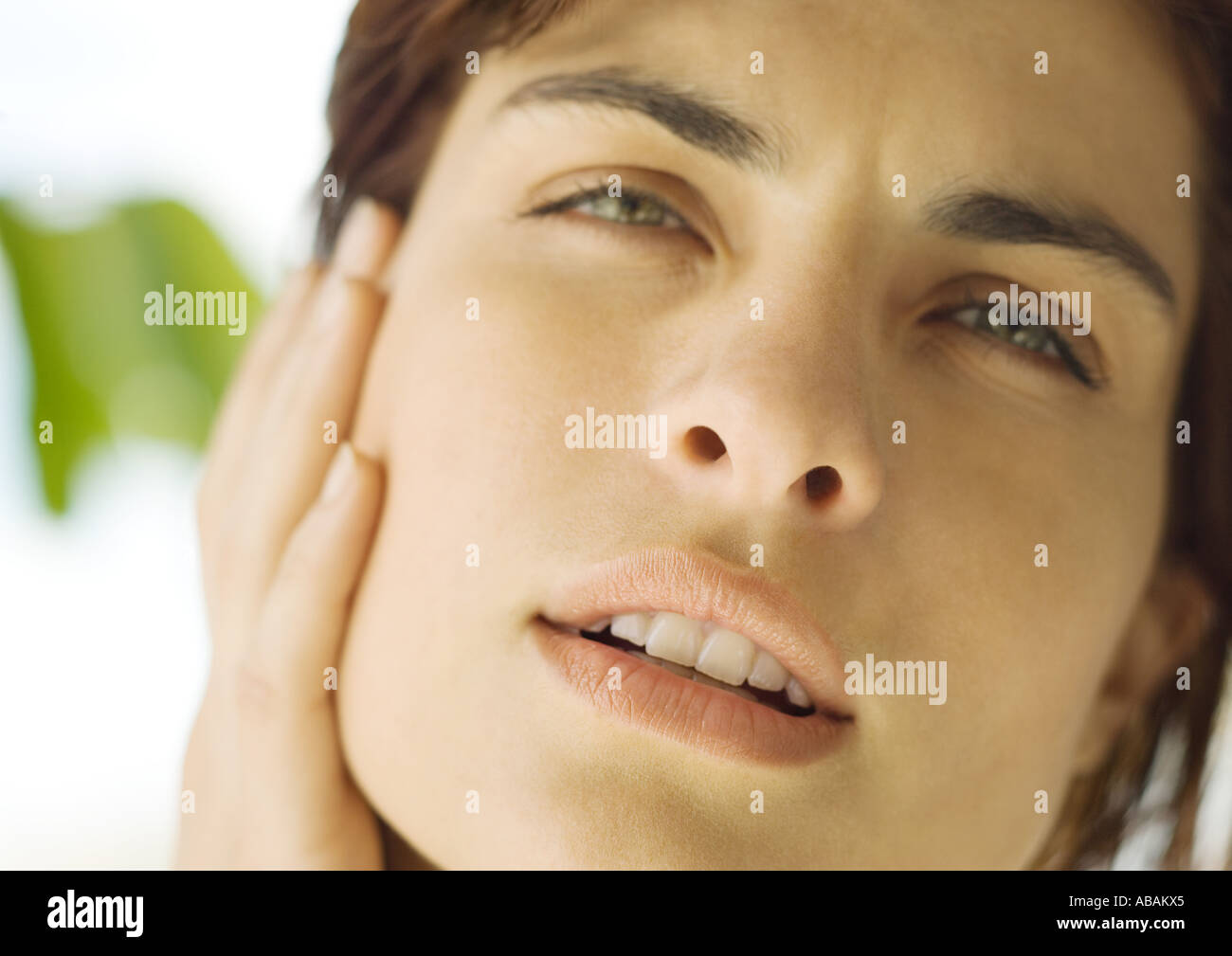 Woman holds cheeks hands hi-res stock photography and images - Alamy