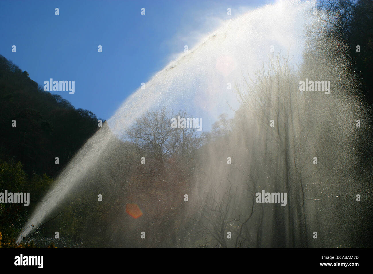 water canon spraying a jet Stock Photo - Alamy
