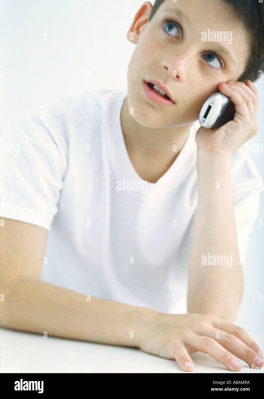 Boy using cell phone Stock Photo - Alamy