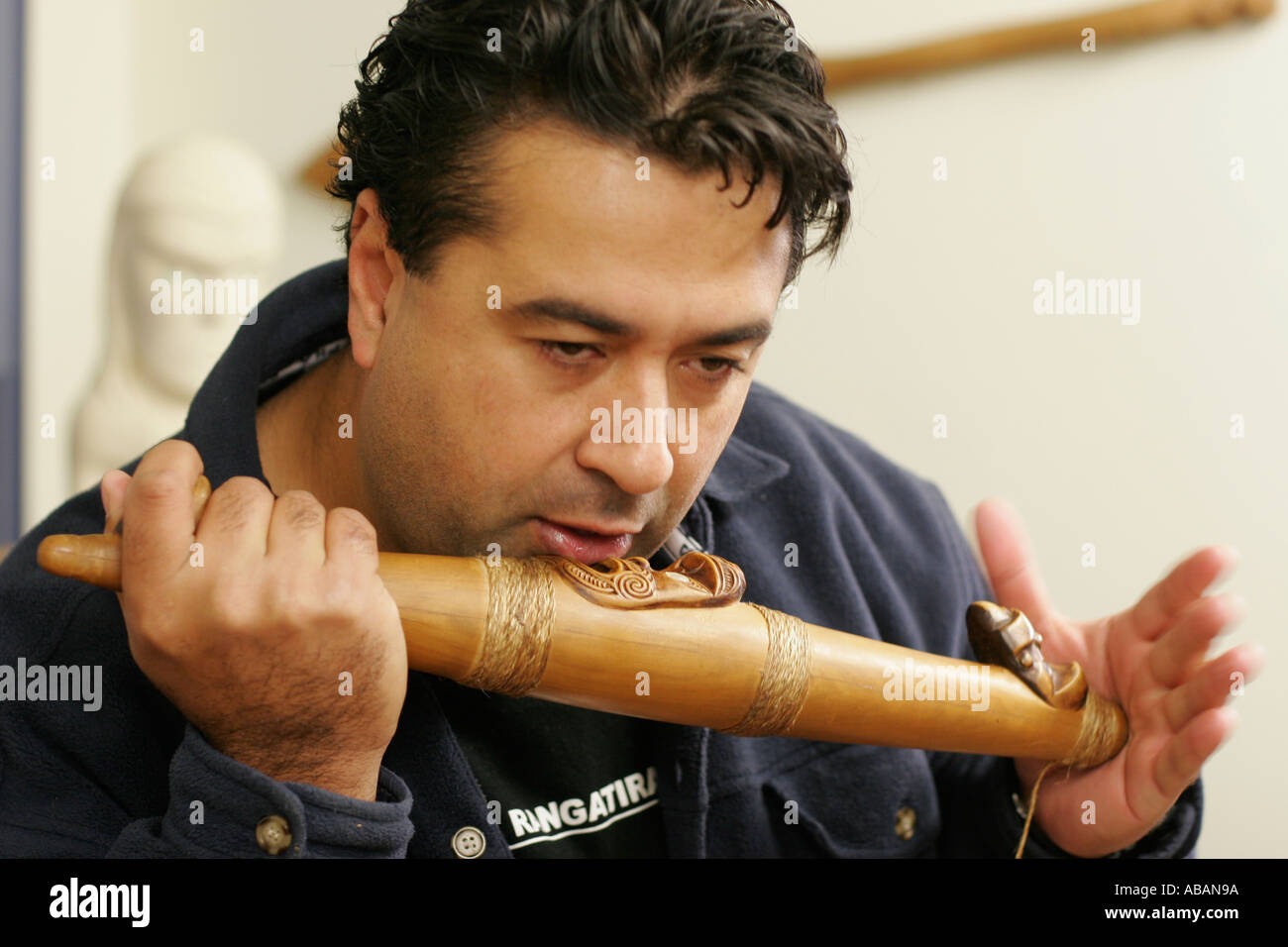 Maori muscian plays a traditional Kauri flute during the Mid Winter ...