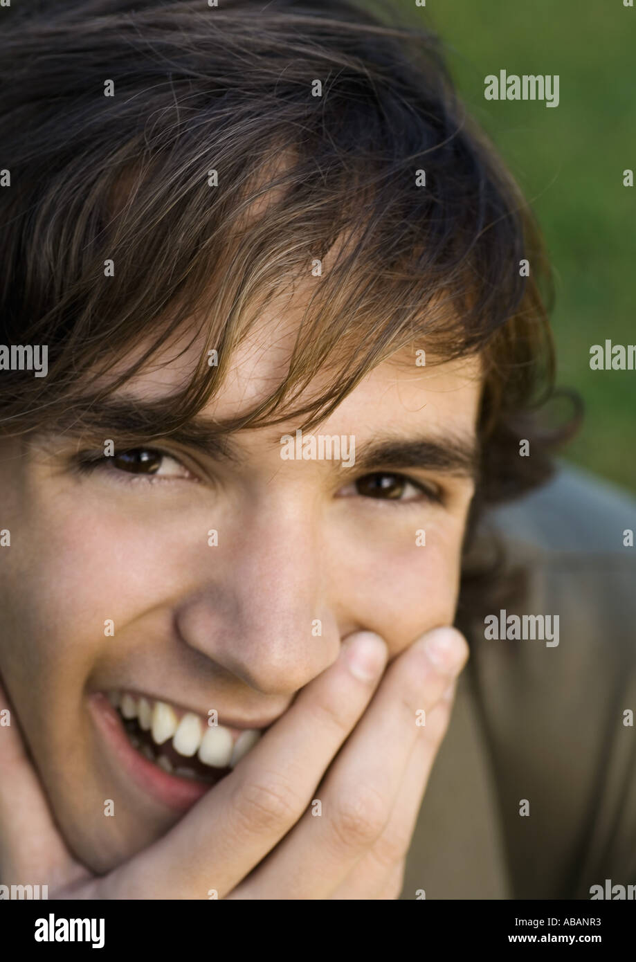Man hand over mouth laughing hi-res stock photography and images - Alamy