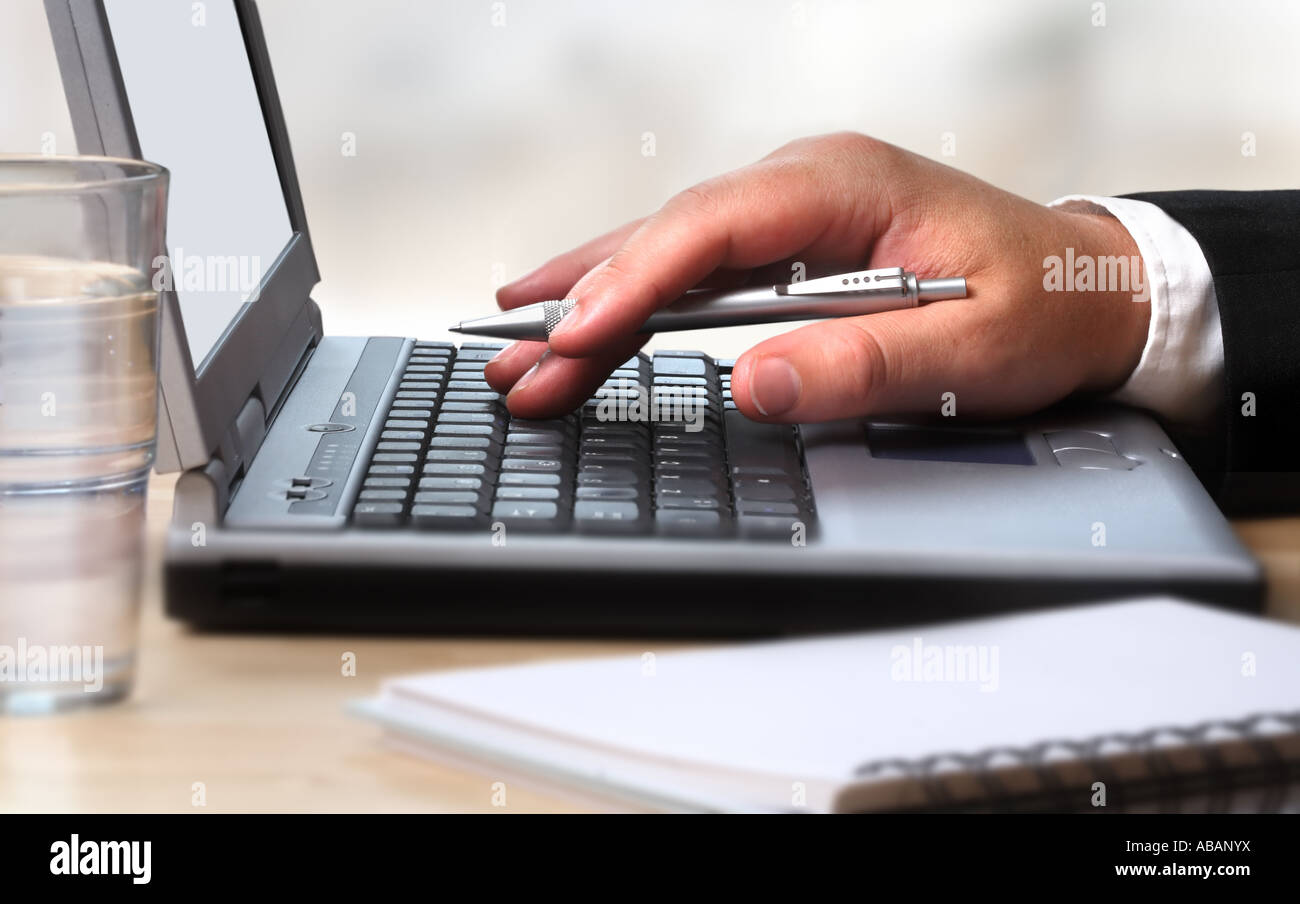 Working with the laptop Stock Photo - Alamy