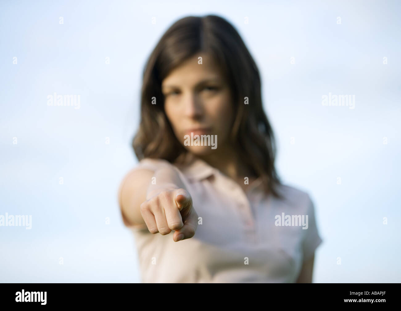 Woman pointing at camera Stock Photo - Alamy