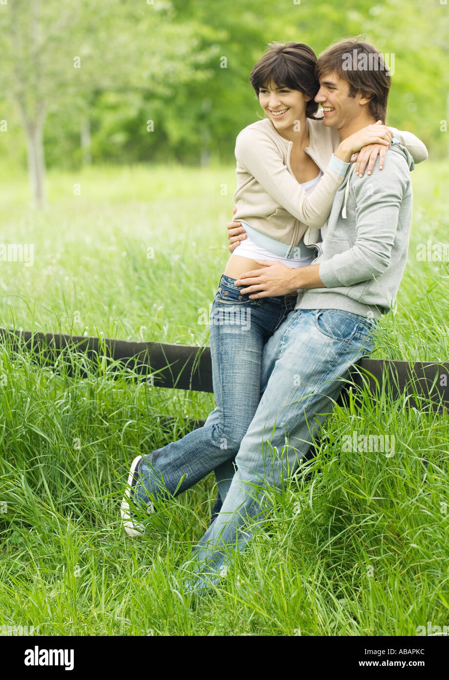 Two young men leaning against fence hi-res stock photography and images ...
