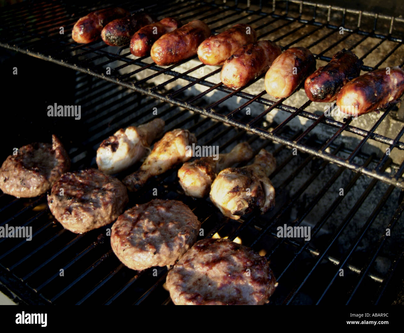 meat cooking on barbecue Stock Photo - Alamy