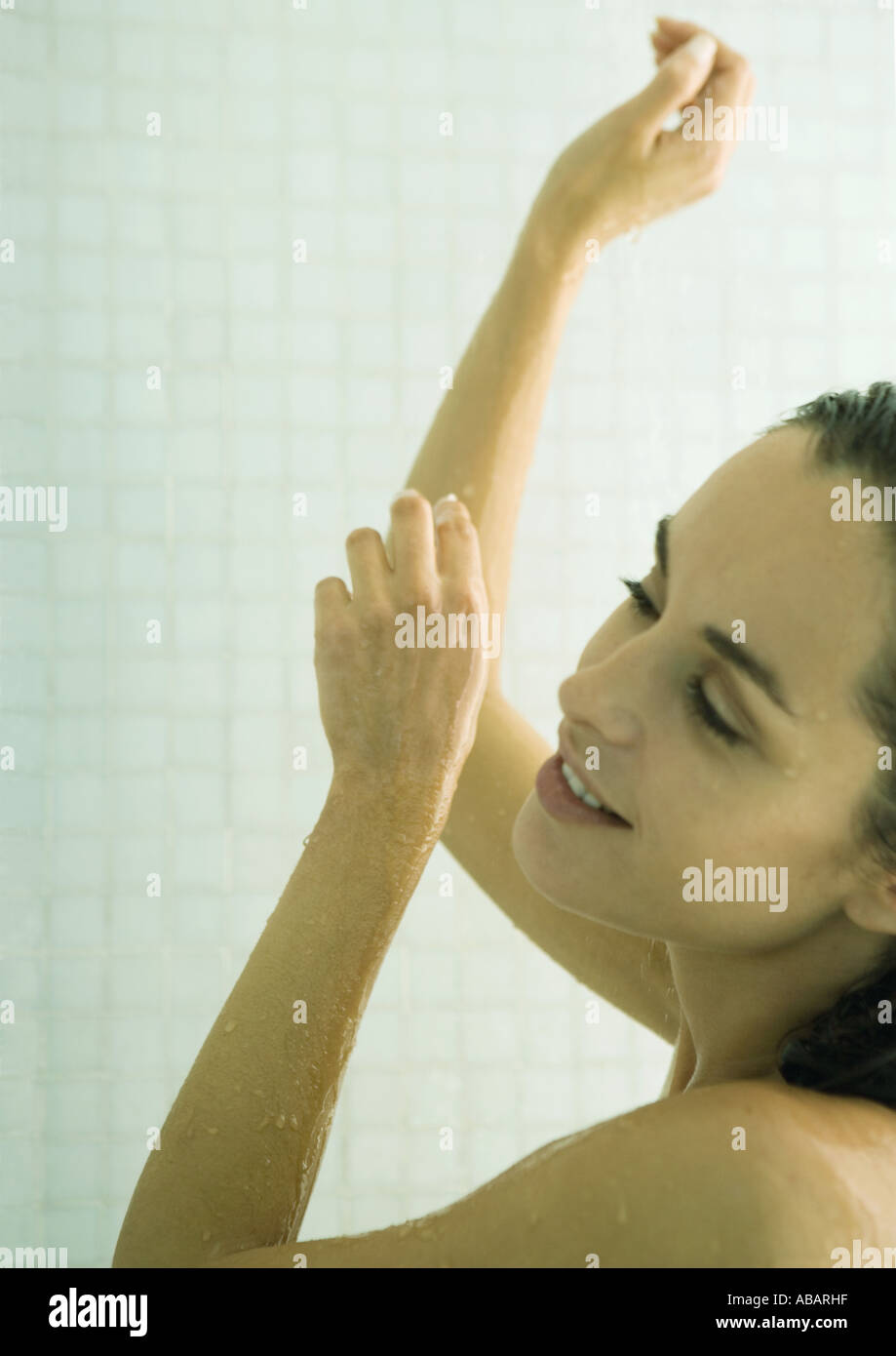 Woman showering front hi-res stock photography and images - Alamy