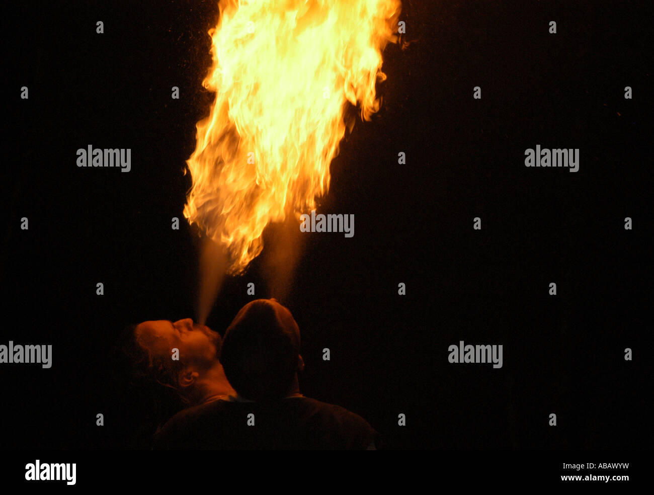 Two Czech men spiting fire during the celebration of Walpurgis Night ...