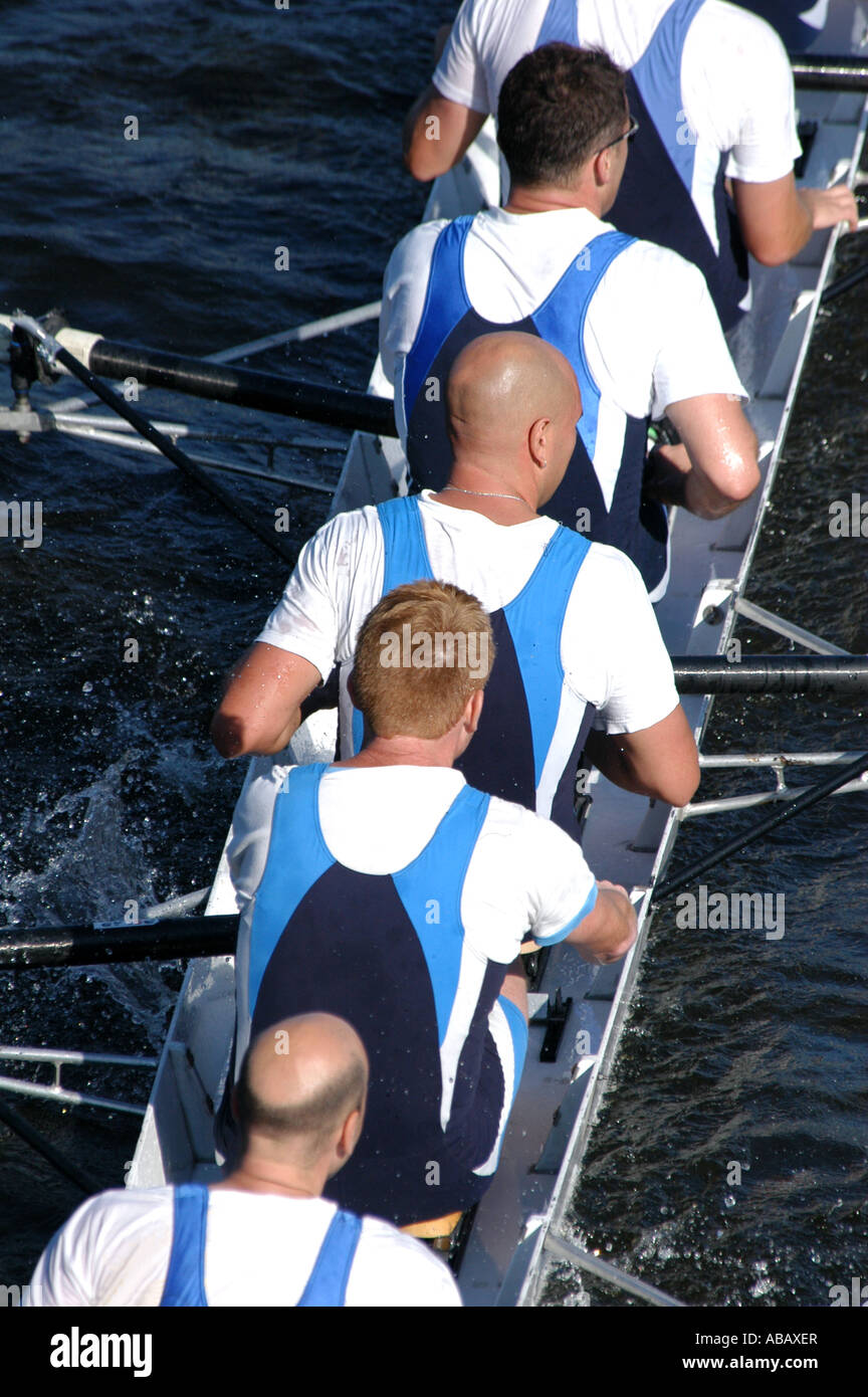 Rowing team rowing ahead ahead during a boat race on the River Vltava ...
