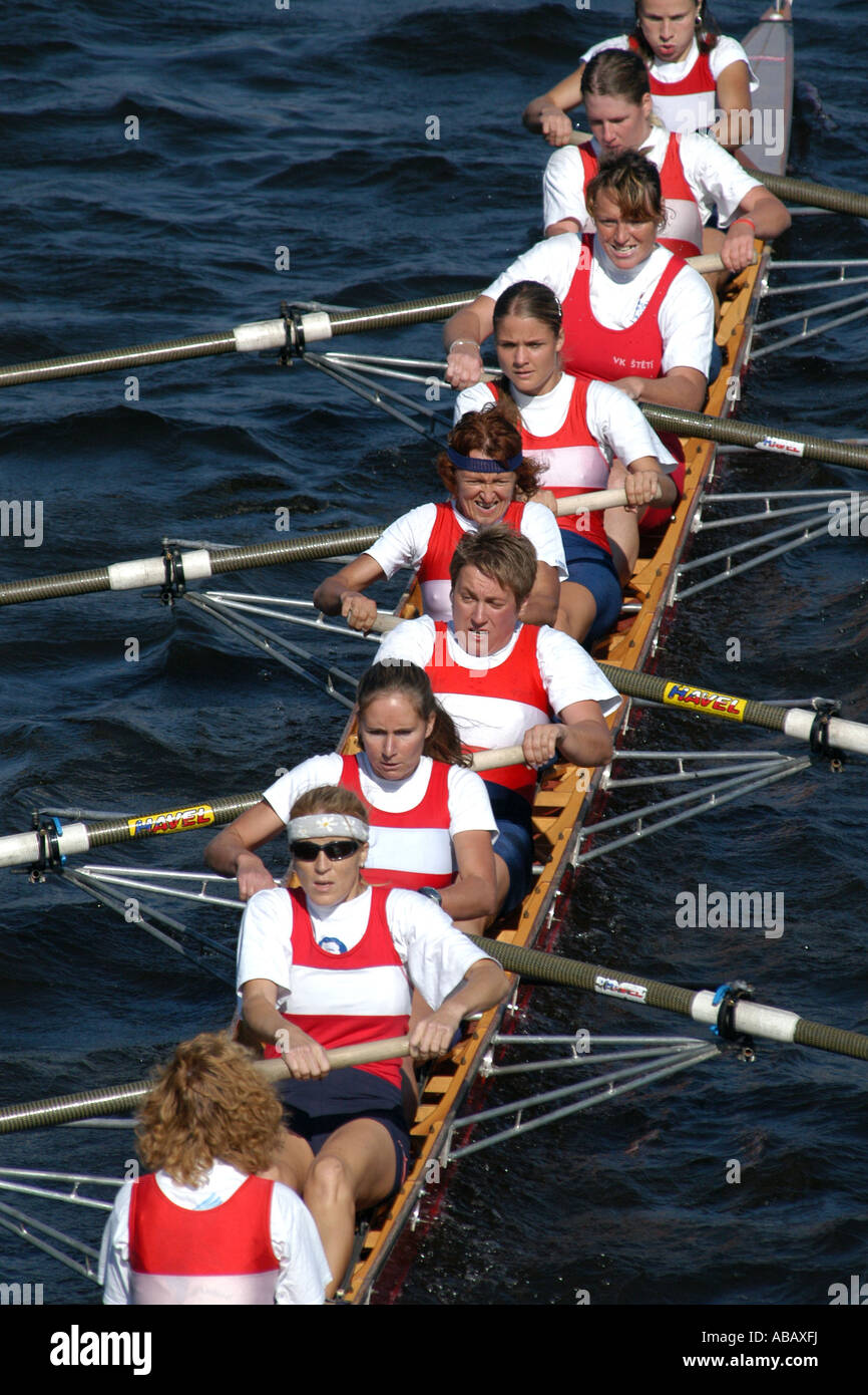 Female rowing team rowing ahead during a boat race on the River Vltava ...