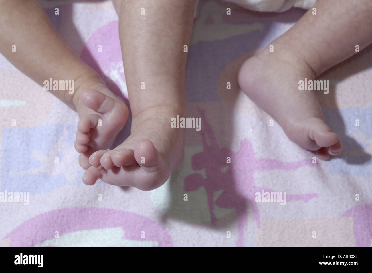 Twin baby feet hi-res stock photography and images - Alamy