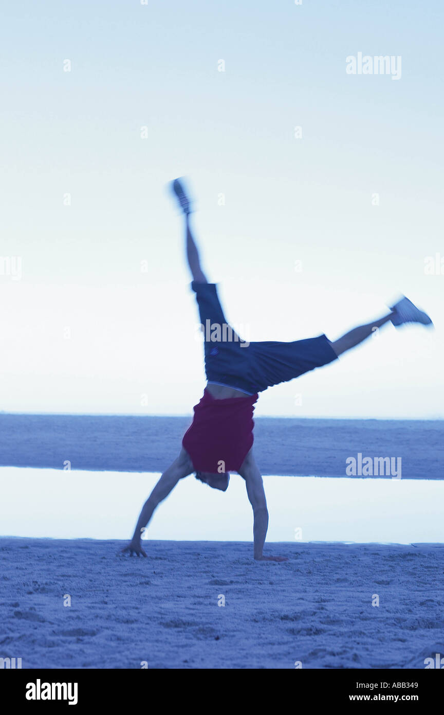 Man turning wheel Stock Photo - Alamy