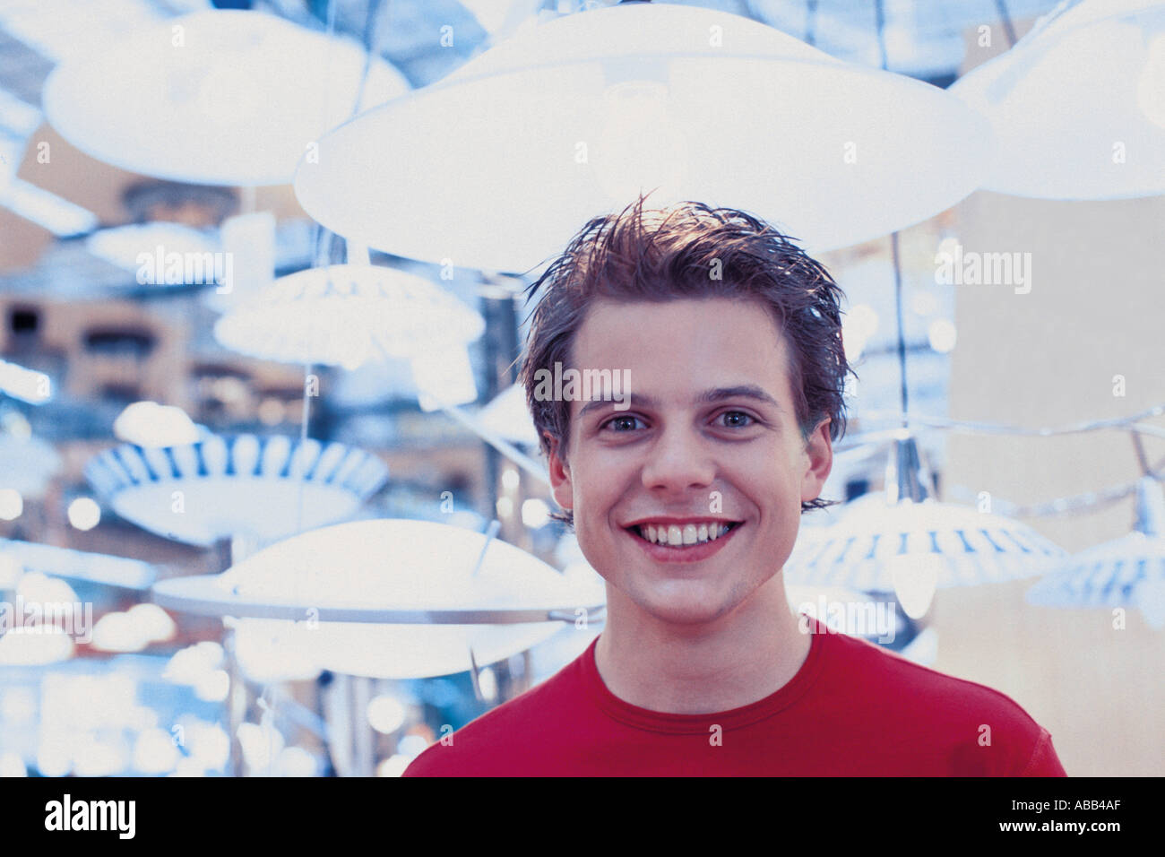 Man in lighting shop Stock Photo - Alamy