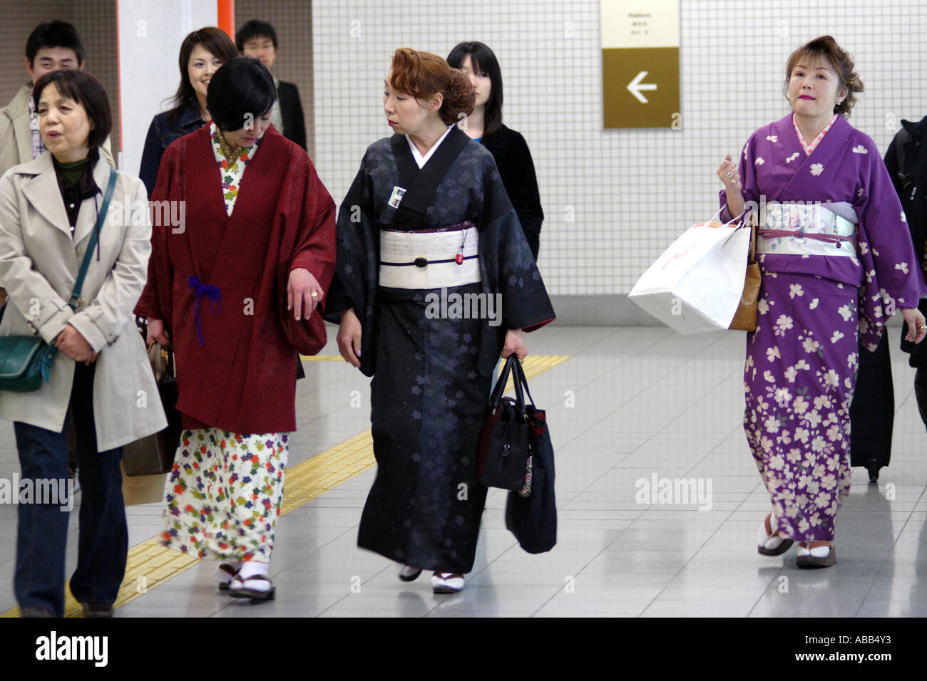 Women Dressed in Traditional Kimono Dresses in the subway, Kyoto, Japan ...