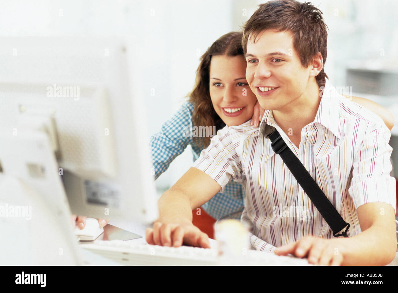 Couple at computer Stock Photo - Alamy