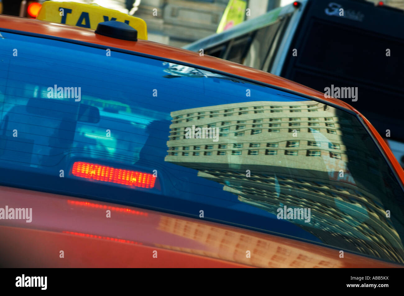 skyscraper buildings reflected in rearview window city taxi cab Stock ...