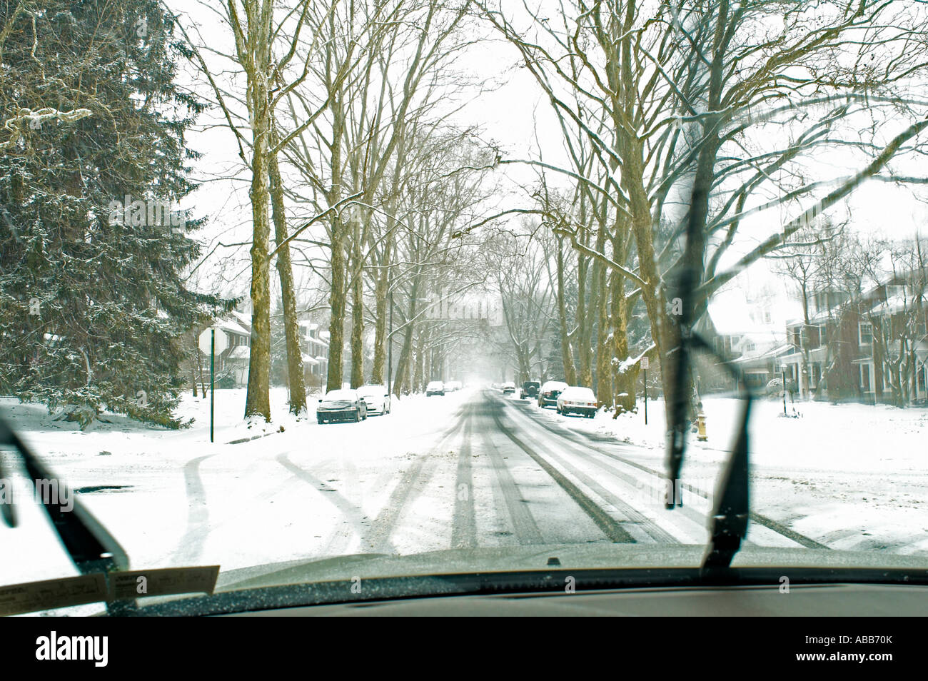 winter street scene from car auto snow plow snowplow Stock Photo - Alamy