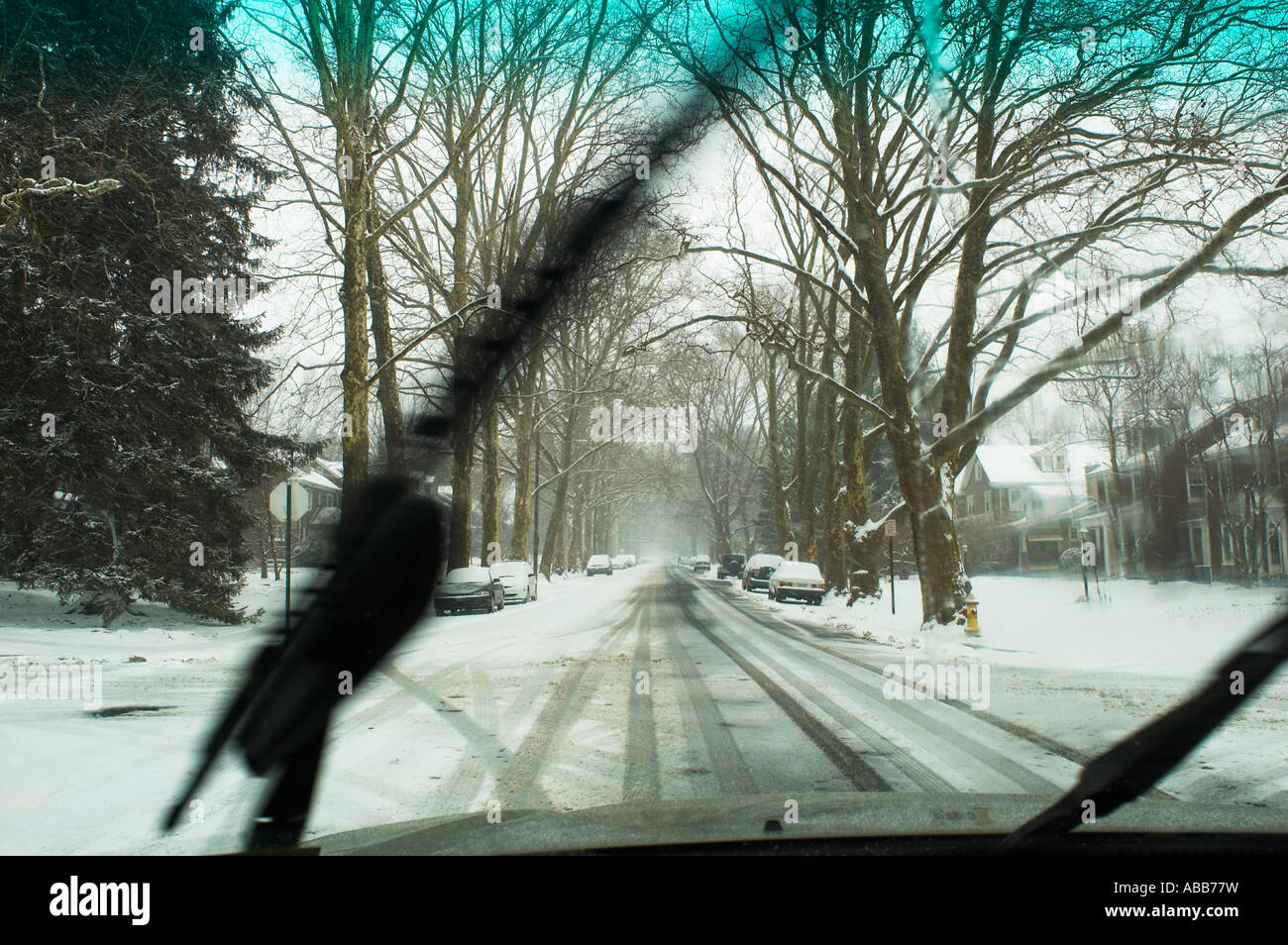 winter street scene from car auto snow plow snowplow Stock Photo - Alamy