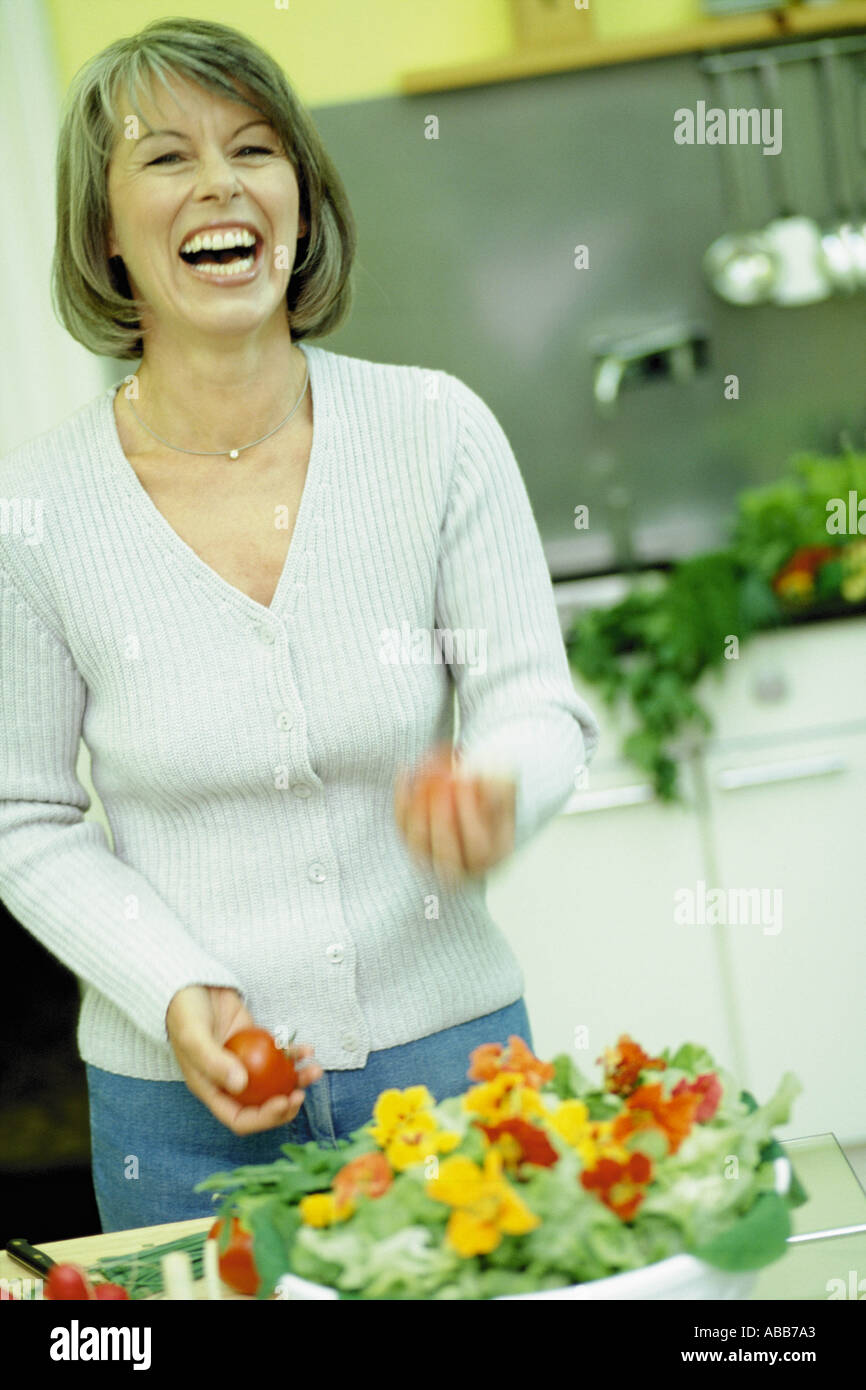 Woman tomato in mouth hi-res stock photography and images - Alamy