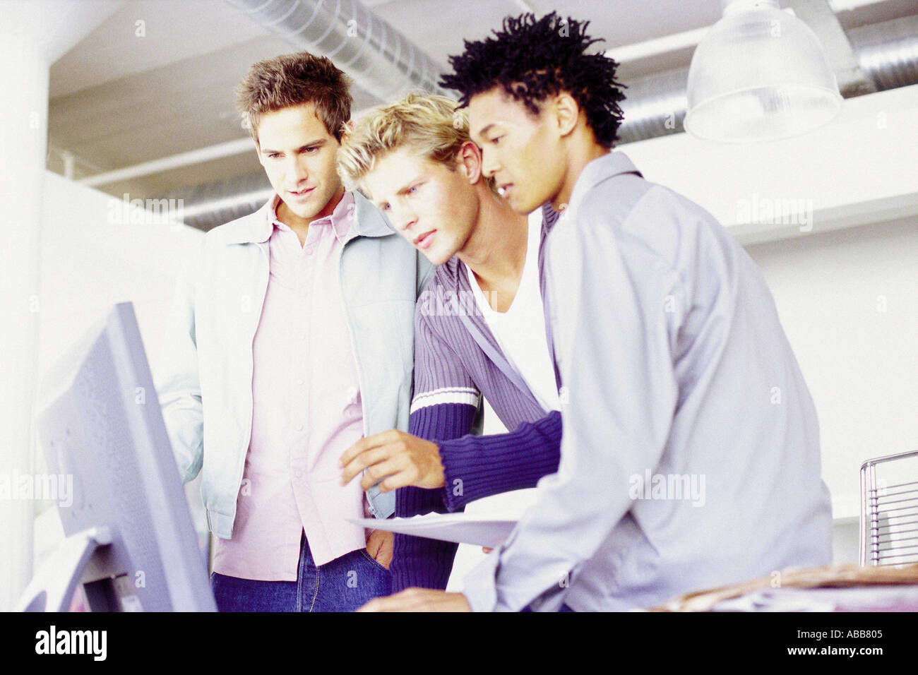 Men in an office Stock Photo - Alamy