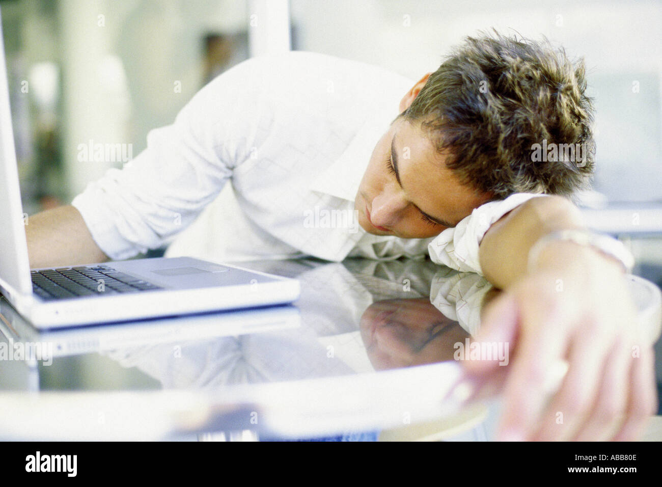 Man asleep at cafe table hi-res stock photography and images - Alamy