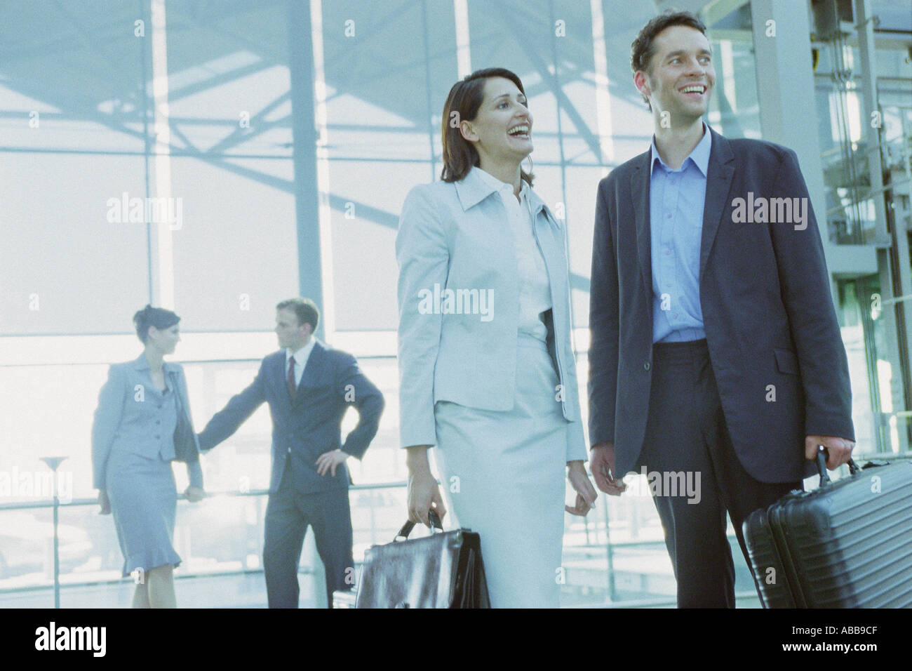 Airport worker leaving terminal hi-res stock photography and images - Alamy