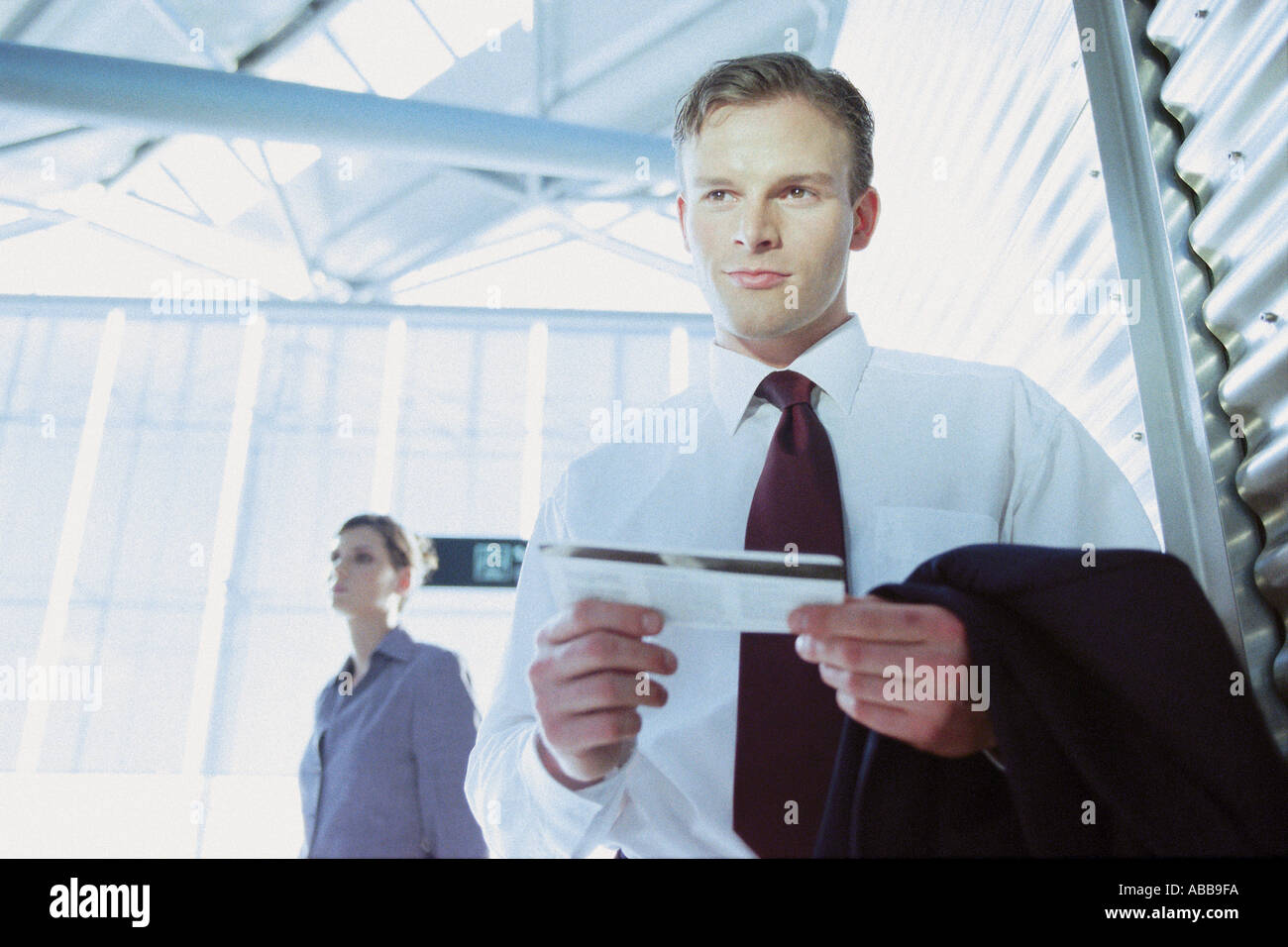 Businessman checking ticket hi-res stock photography and images - Alamy