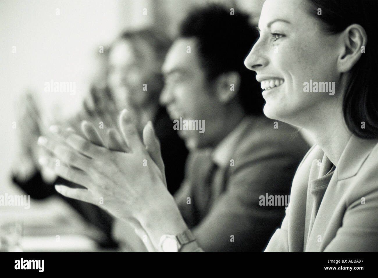 Working group applauding business hi-res stock photography and images ...