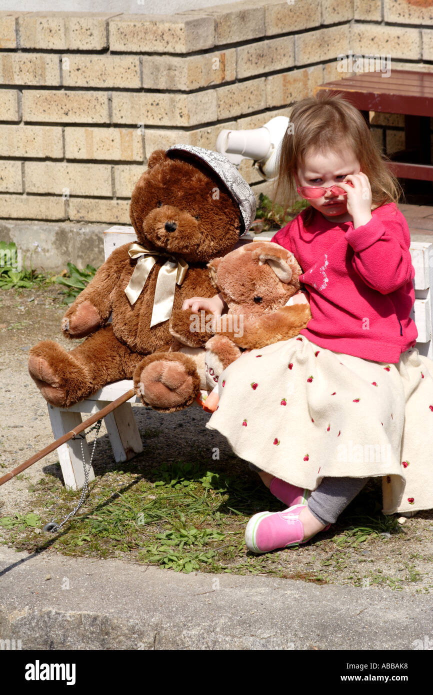 Little Girl Fishing with Teddy Bears Stock Photo - Alamy