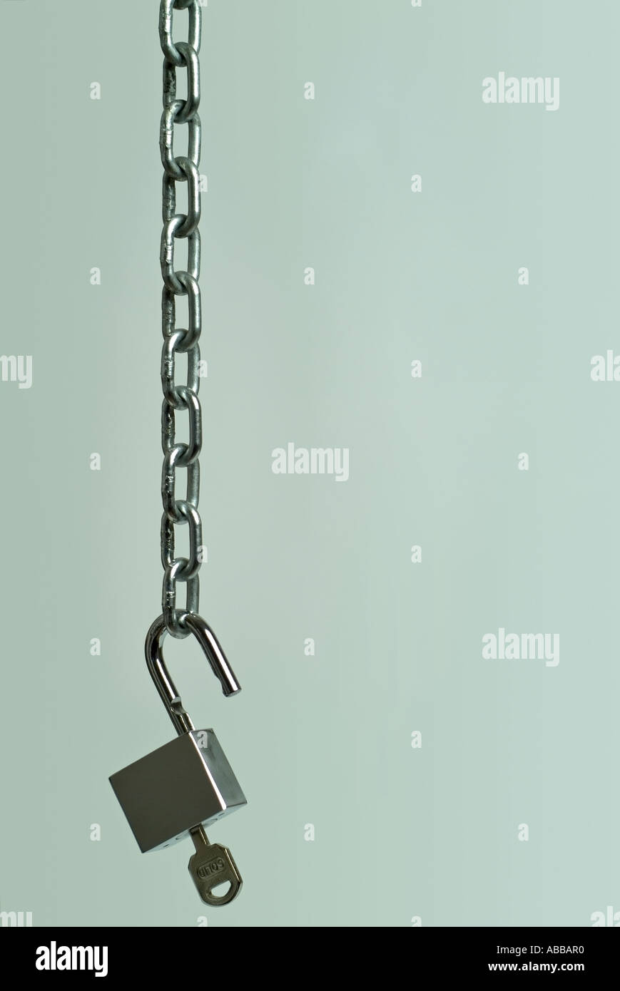 Metal Chain And An Unlocked Padlock Stock Photo - Alamy