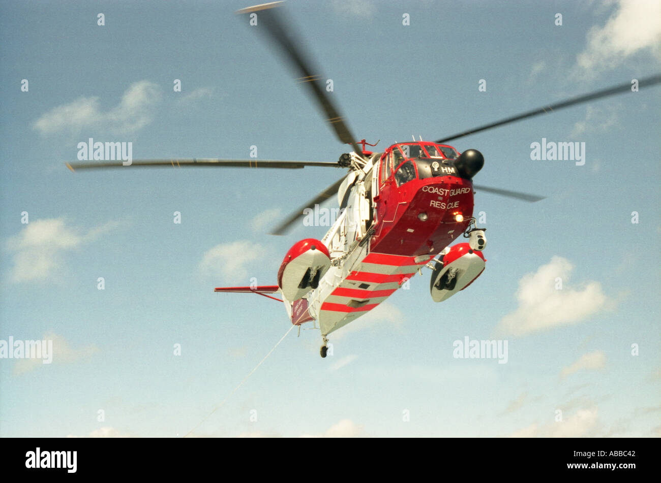 Coastguard Rescue Helicopter seen from below on board a boat Stock ...
