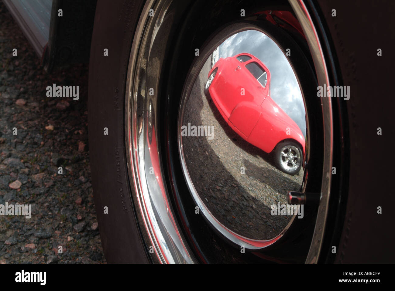 reflection of a hot rod in a hub cap Stock Photo - Alamy
