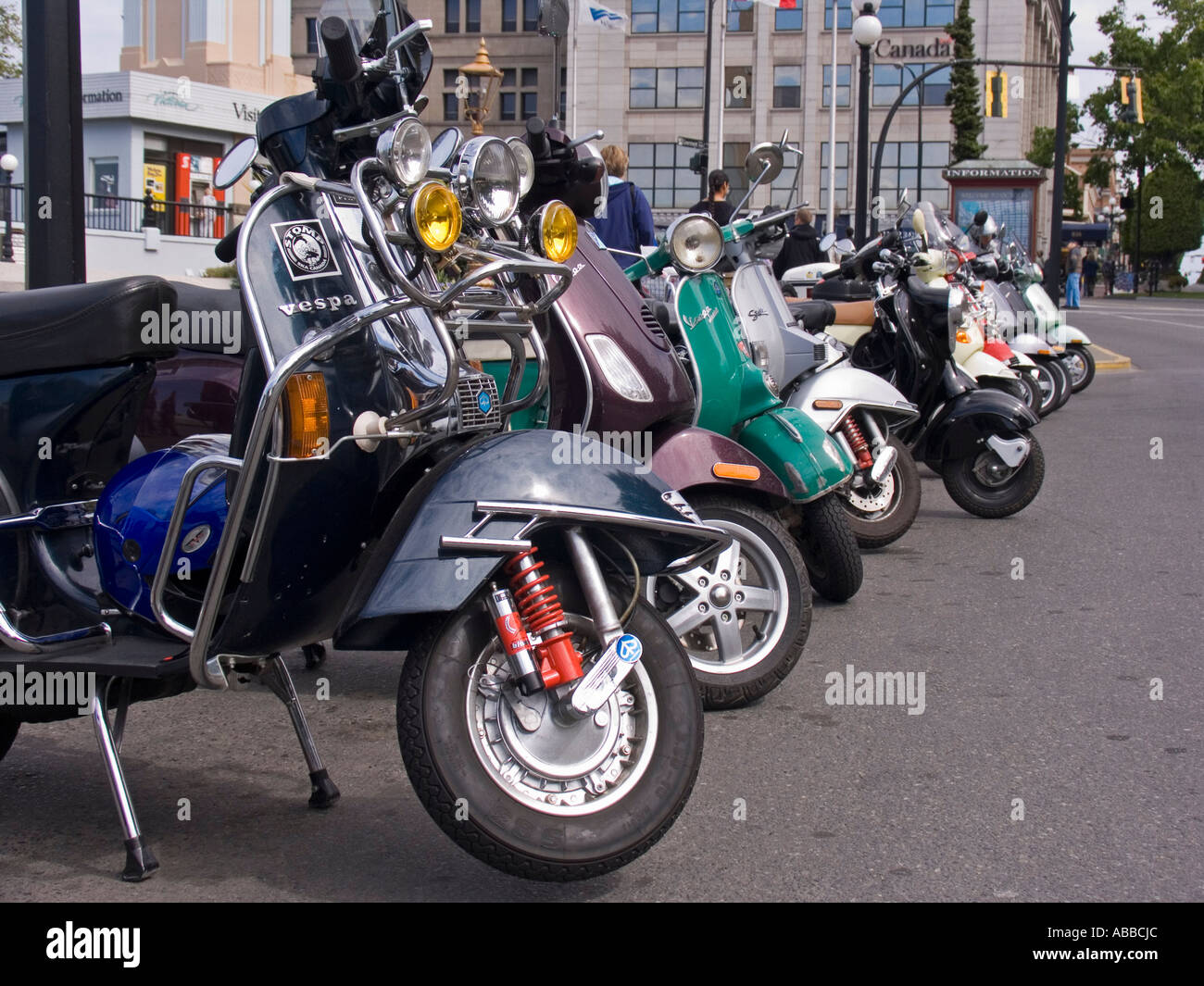 Motorscooters parked in line on Government Street Victoria BC Canada ...