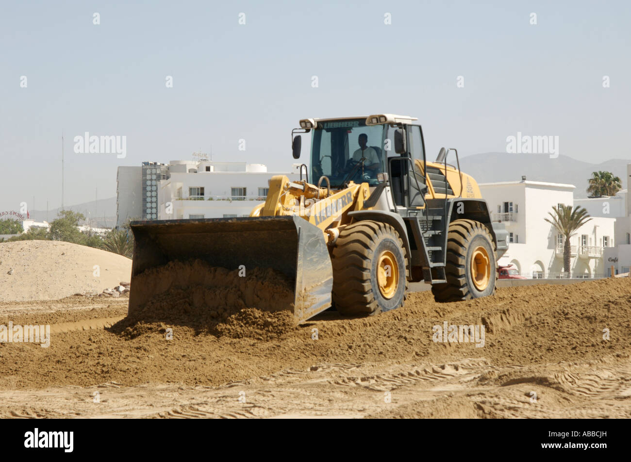 adding sand to the beach at Agadir Stock Photo - Alamy