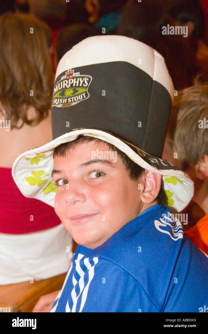 Young Boy Wearing a Murphy's Hat Stock Photo - Alamy