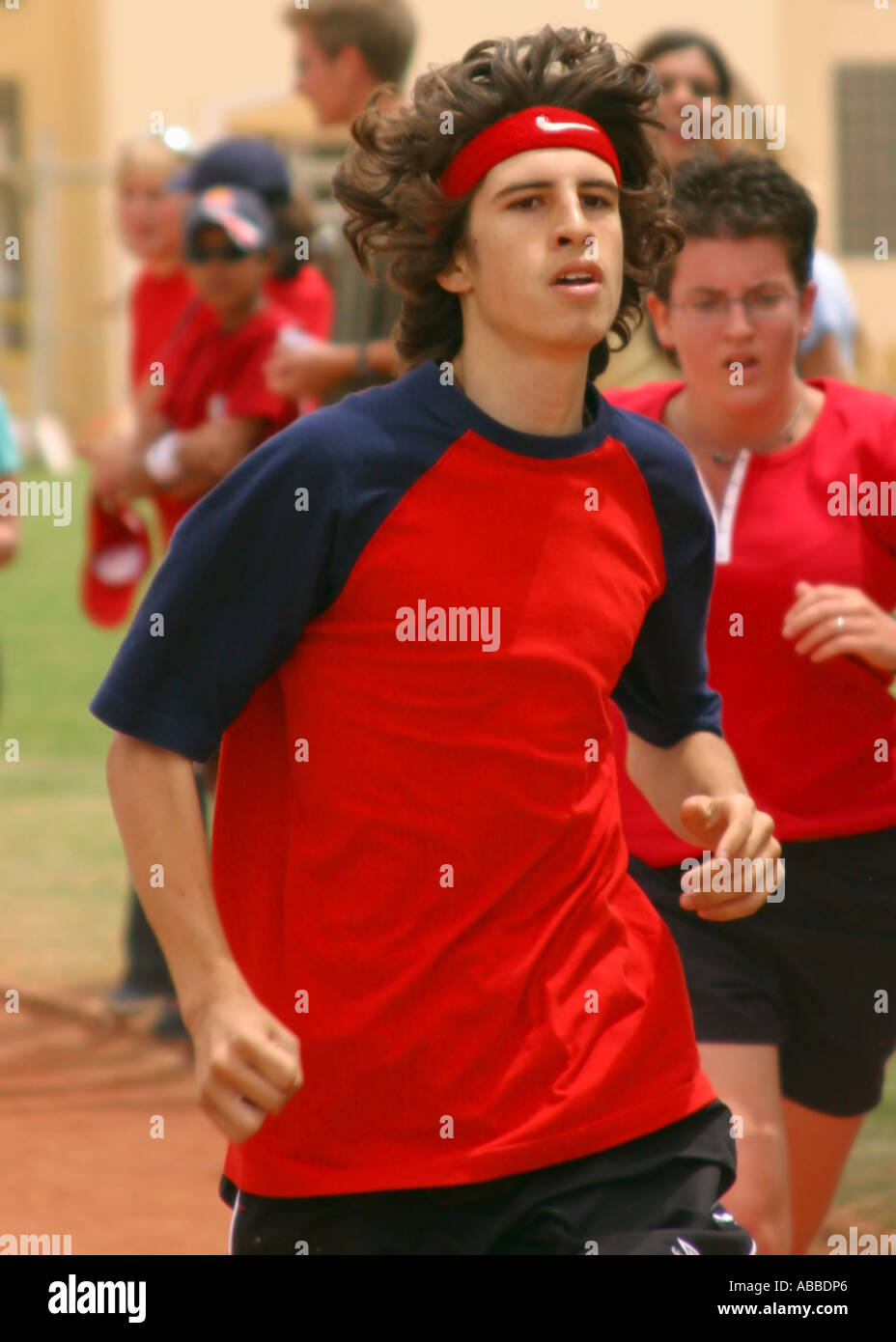 school boy running at school sports day Stock Photo - Alamy