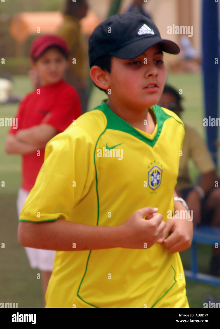 school boy running at school sports day Stock Photo - Alamy