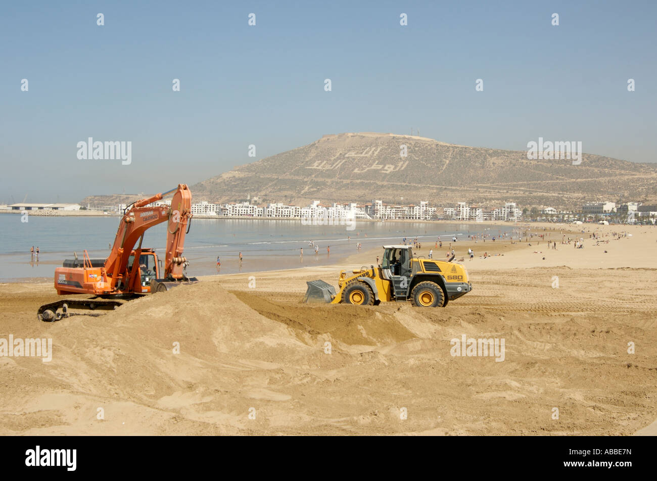 adding sand to the beach at Agadir Stock Photo - Alamy