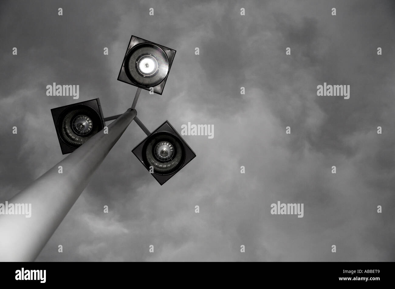 Three lights on pole side view Stock Photo - Alamy