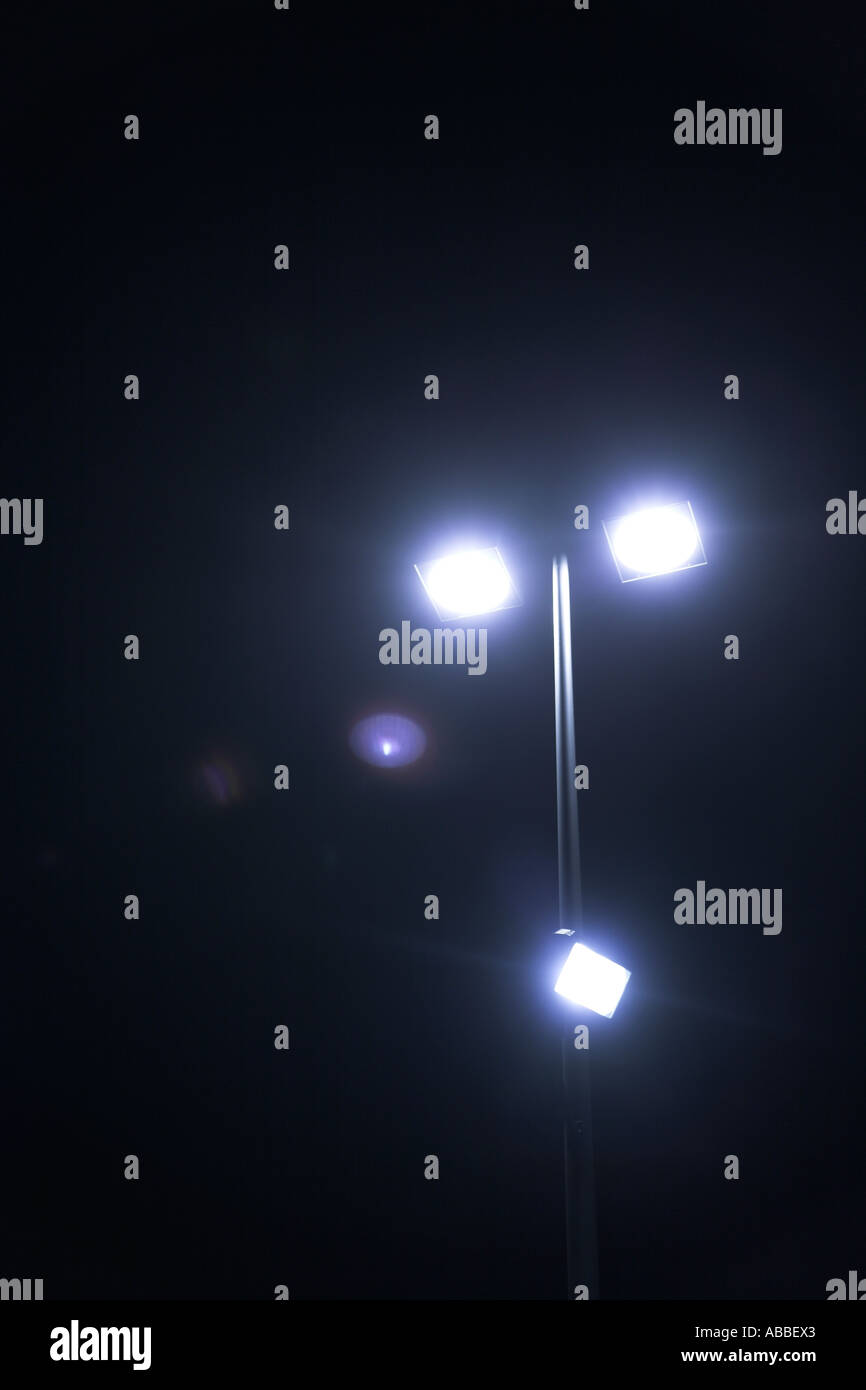 Three lights shine at night Stock Photo - Alamy