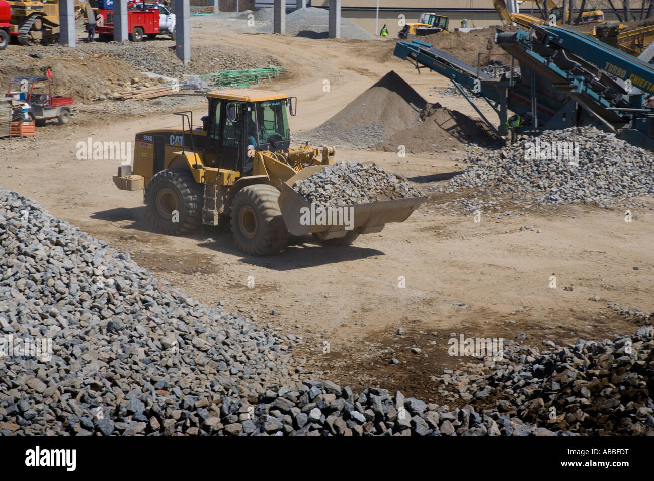 Truck moving rocks at a construction site Stock Photo - Alamy
