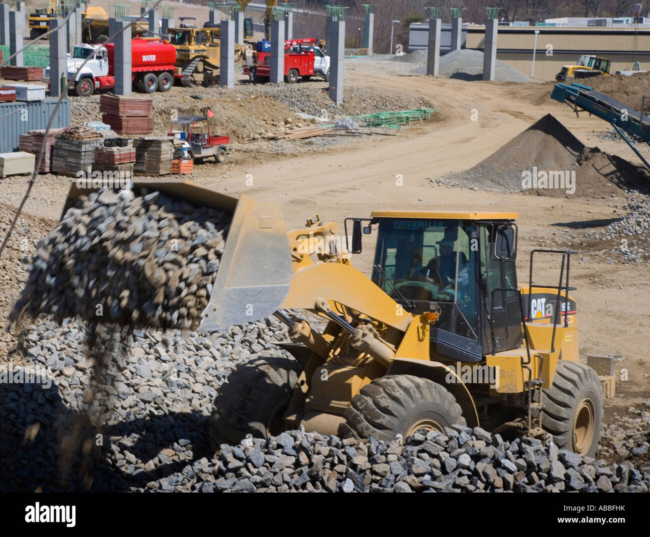Truck moving rocks at a construction site Stock Photo - Alamy