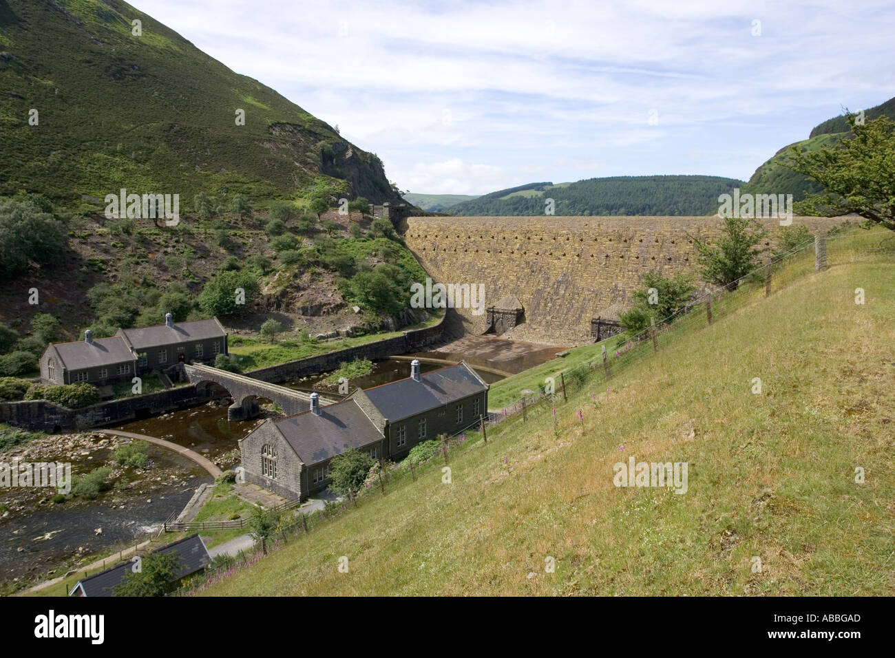 Dam wall built in the 1890s at Caban Coch reservoir with electricity ...