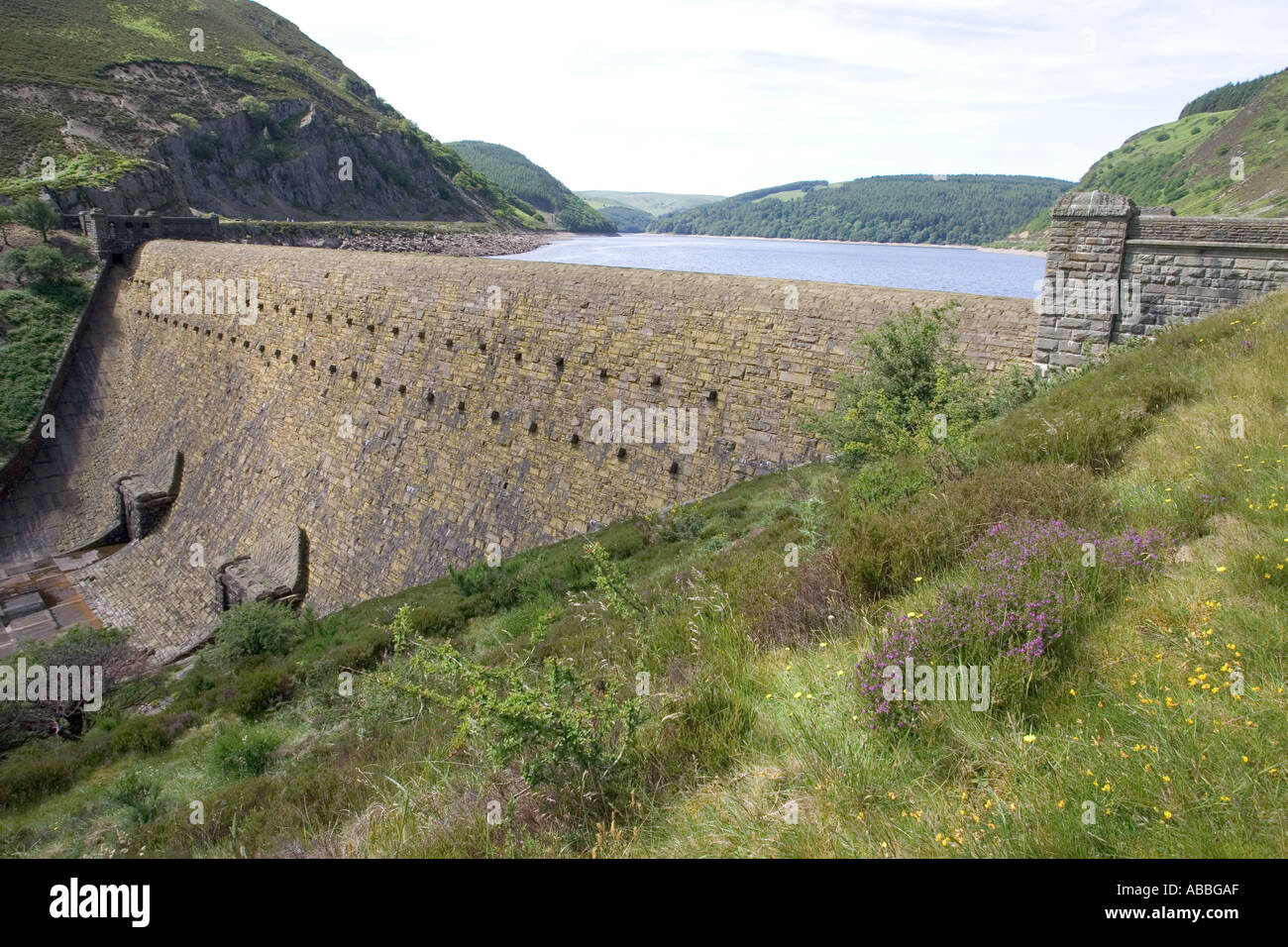 Dam wall built in the 1890s at Caban Coch reservoir with electricity ...