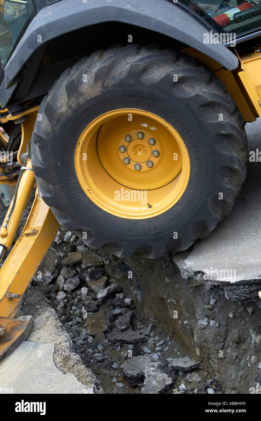 close up back hoe wheel construction site Stock Photo - Alamy