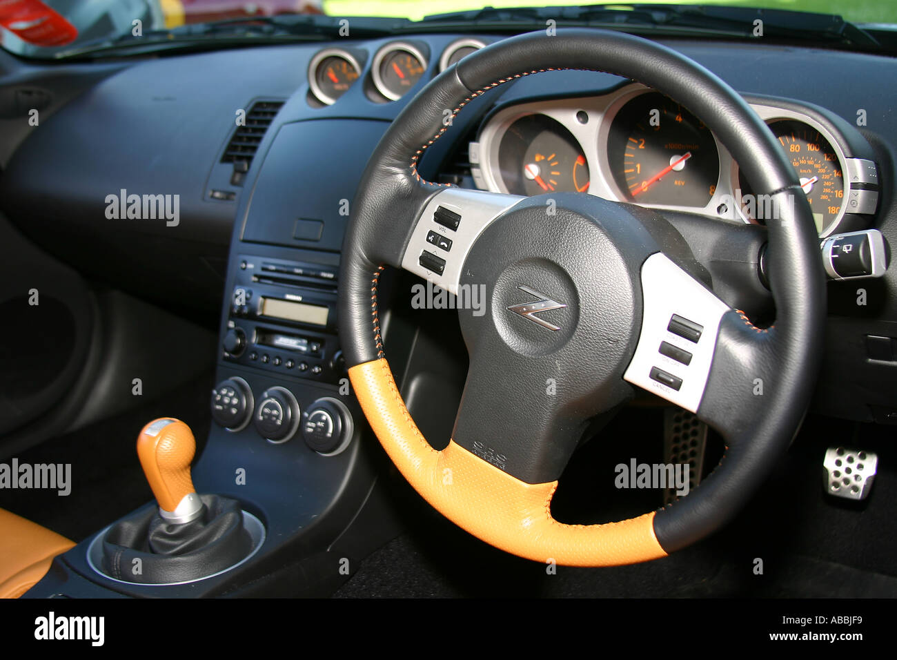 Modern car dash board and steering wheel Stock Photo - Alamy